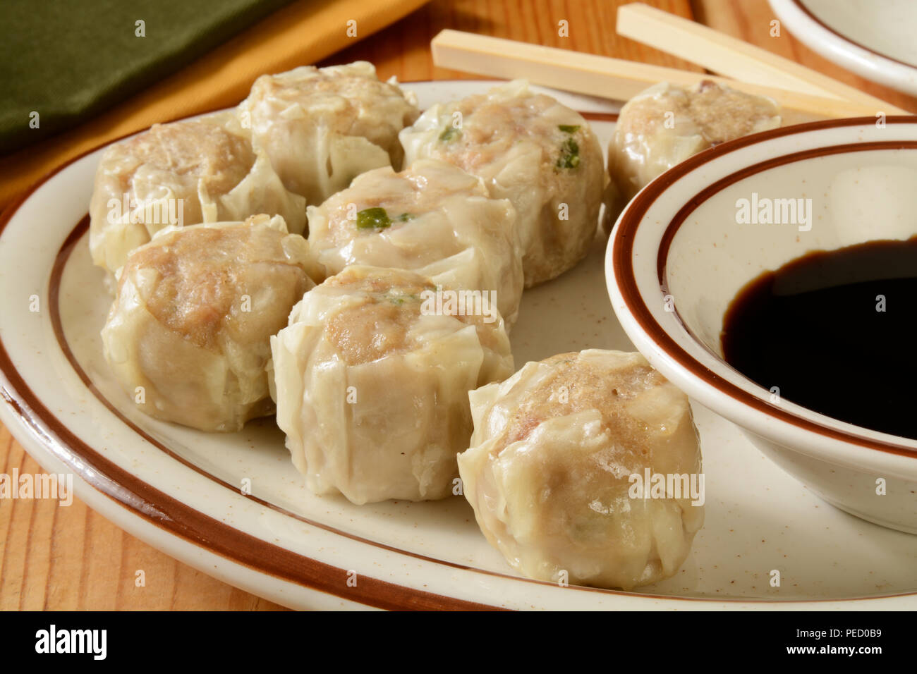 Chinese pork dumplings with soy sauce and chop sticks Stock Photo - Alamy