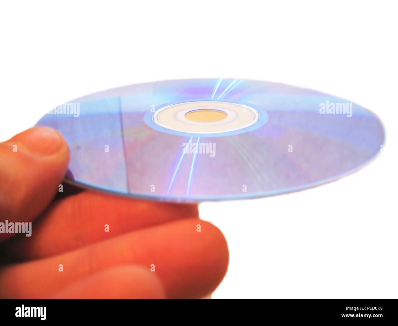 Mans hand holding compact disc on the finger isolated Stock Photo - Alamy