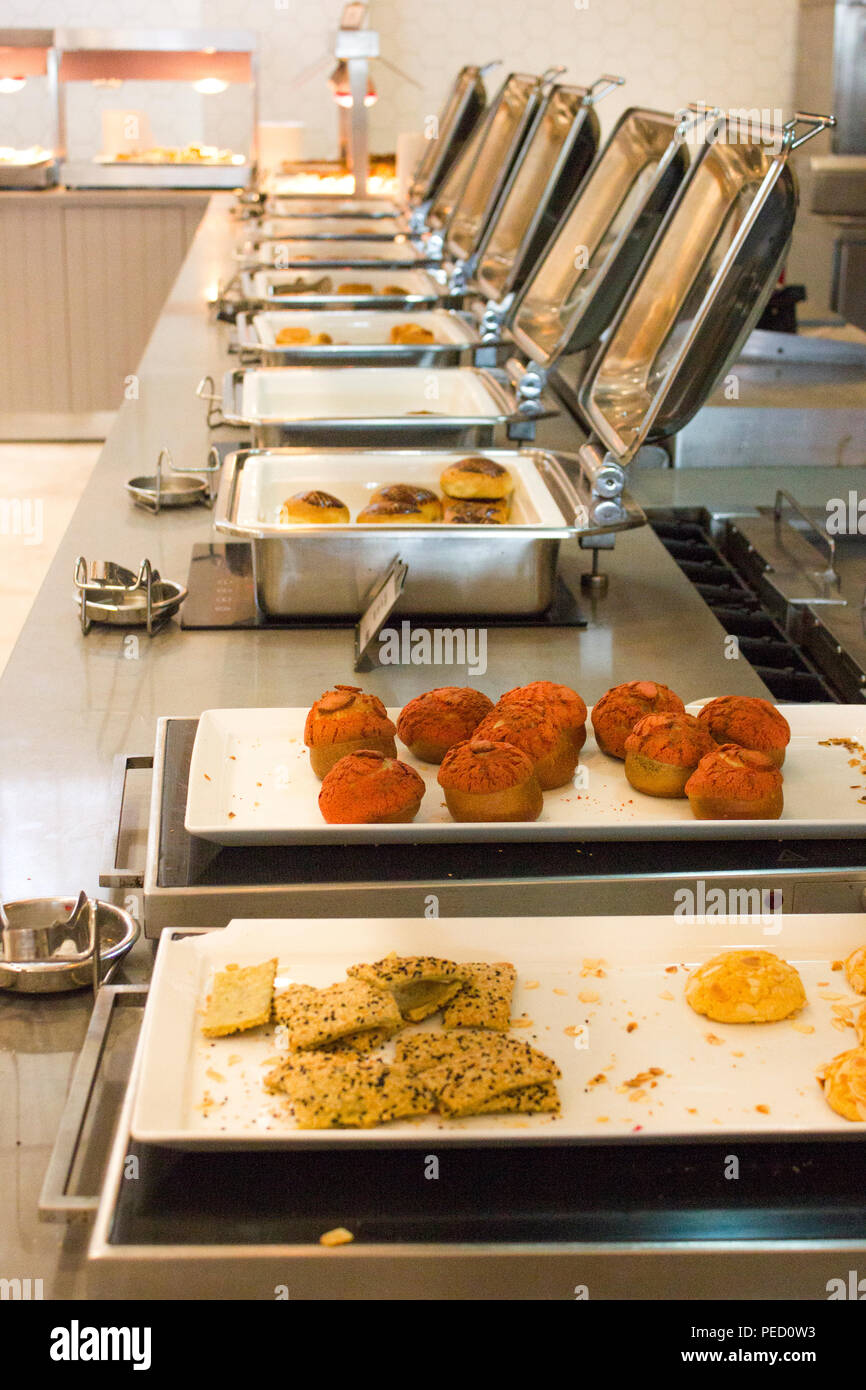 Open buffet at the hotel. Variety of buns and cakes Stock Photo - Alamy
