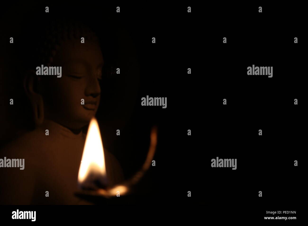 Buddhist oil lamp hi-res stock photography and images - Alamy