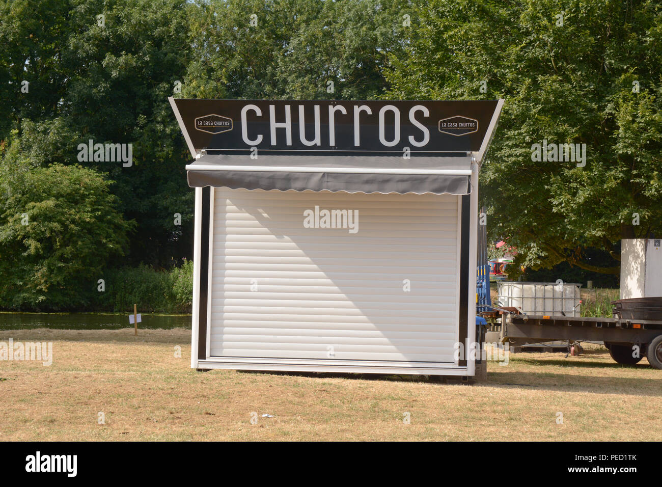 Churros stand at festival Stock Photo - Alamy