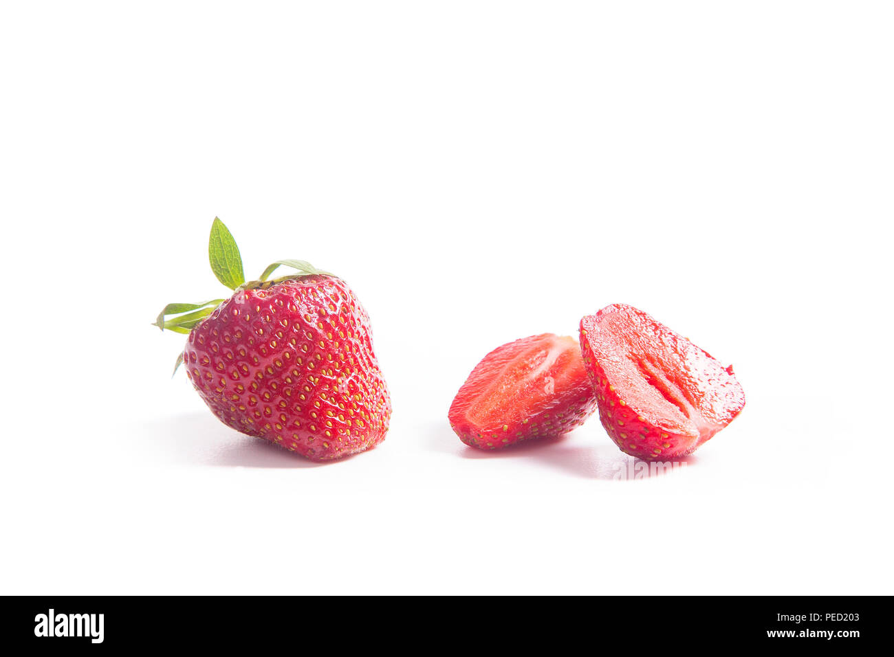 Sweet strawberry with sliced half and whole berry. Fresh raw red ...