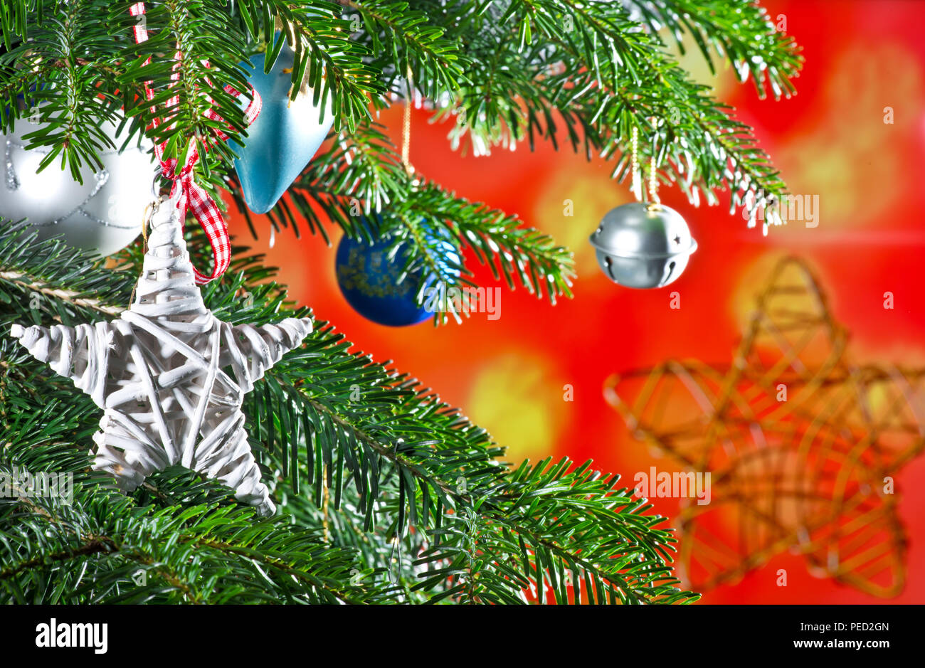Christmas Background with Christmas Star on the Tree Stock Photo - Alamy
