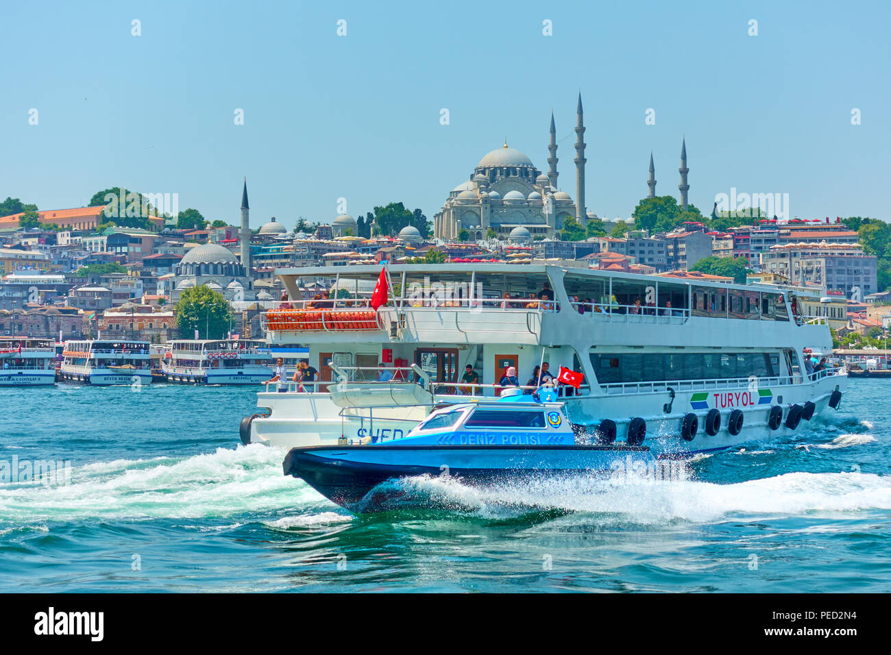 Istanbul, Turkey - July 17, 2018: Police motorboat and pleasure boat in ...