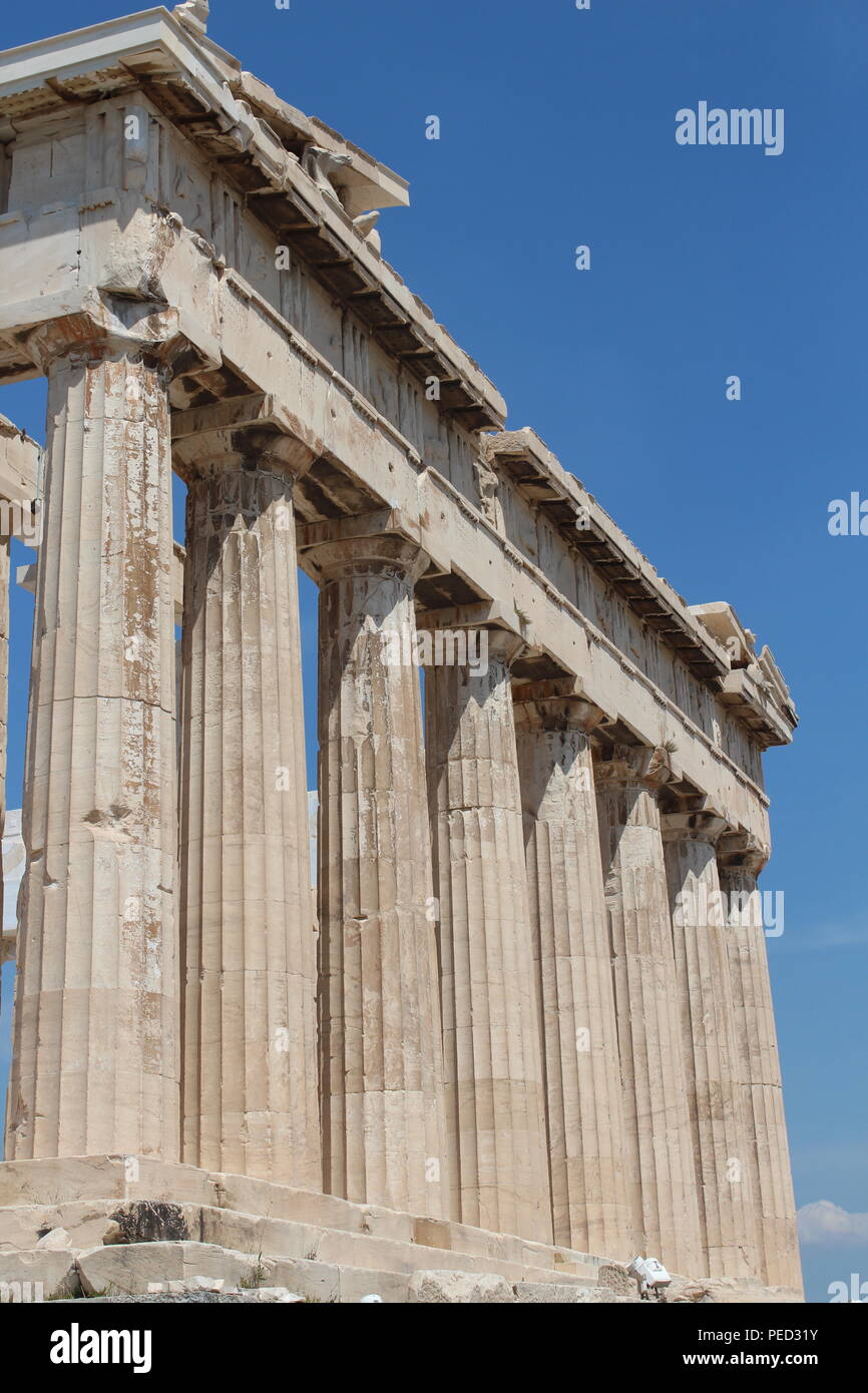 Angle view of the columns of the Parthenon at the Acropolis in Athens ...