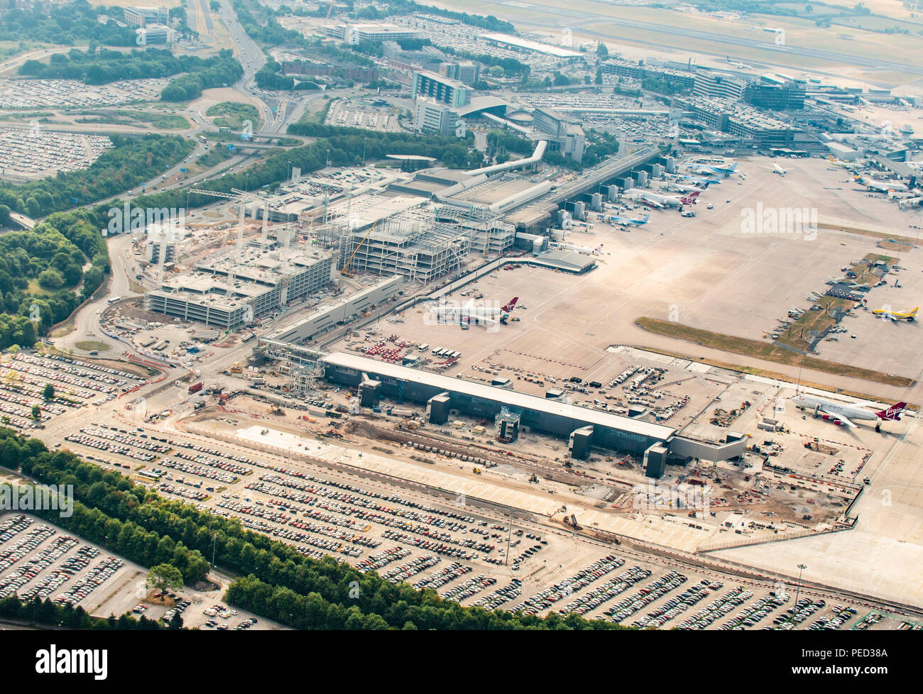 Manchester Airport aerial photo over new terminal construction project ...