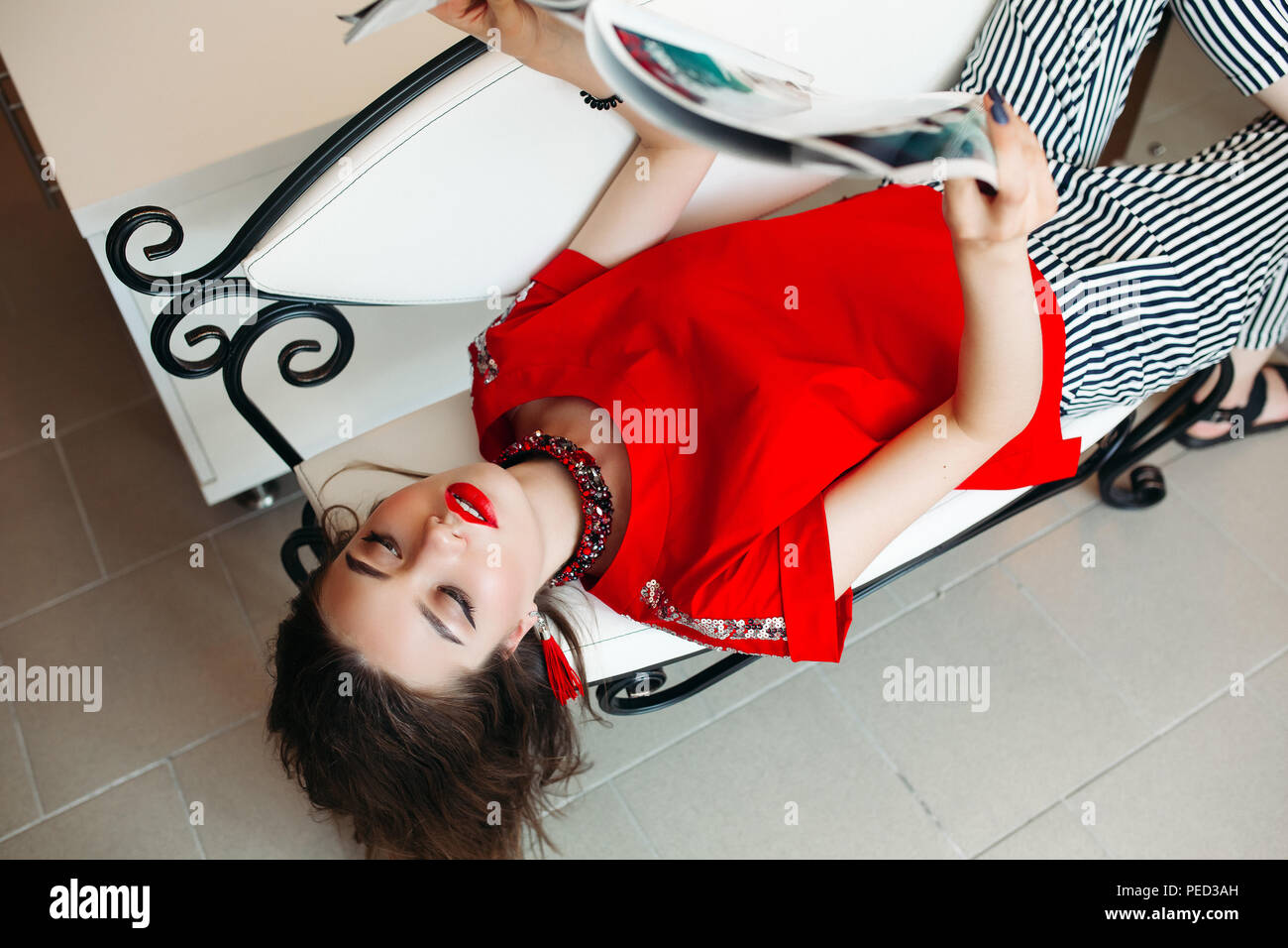 Vogue magazine reading hi-res stock photography and images - Alamy