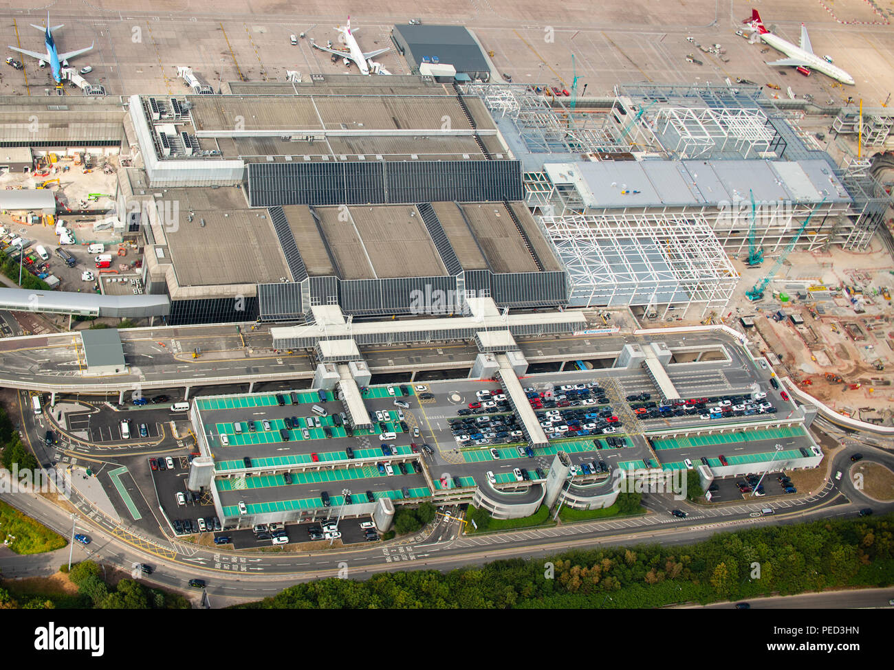 Manchester Airport aerial photo over new terminal construction project ...