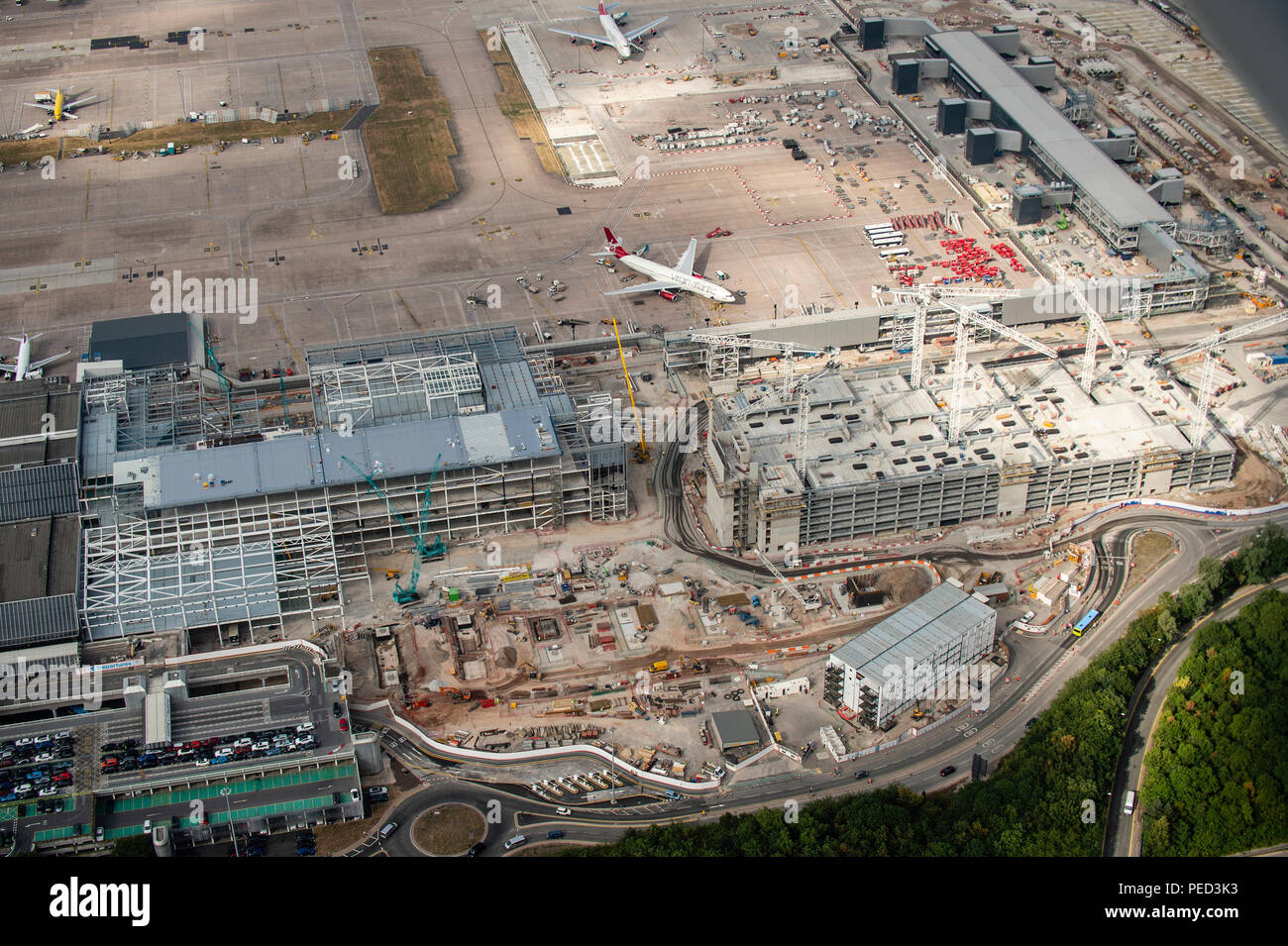 Manchester Airport aerial photo over new terminal construction project ...