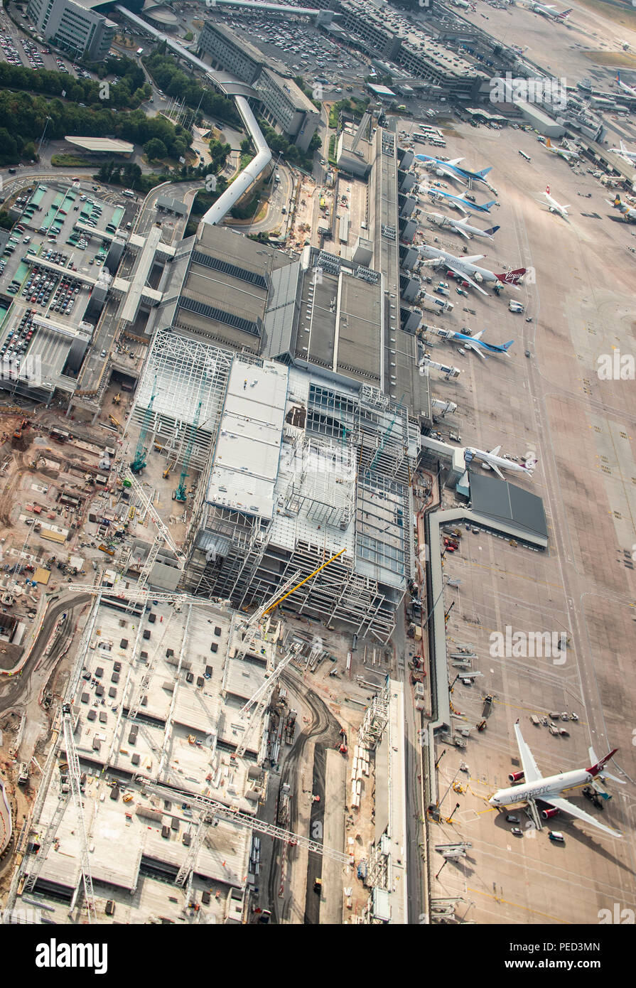 Manchester Airport aerial photo over new terminal construction project ...