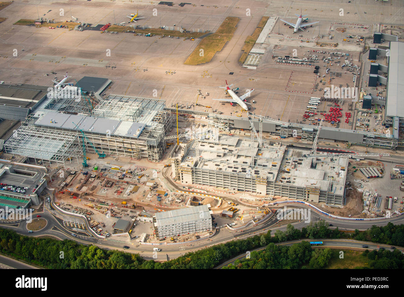 Manchester Airport aerial photo over new terminal construction project ...