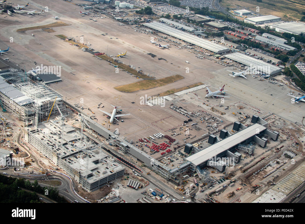 Manchester Airport aerial photo over new terminal construction project ...