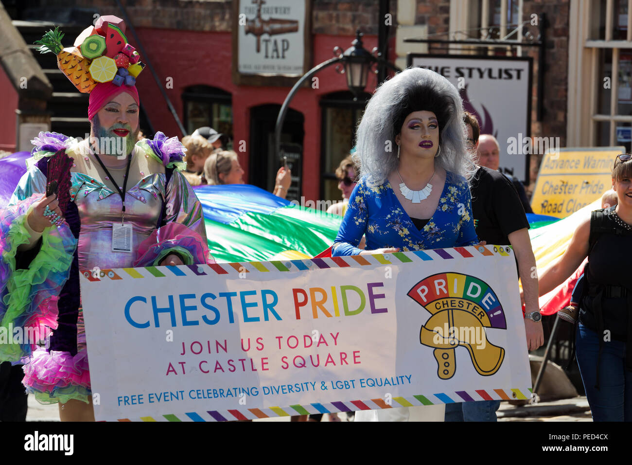 Drag artists lead the procession through the streets of Chester at the ...