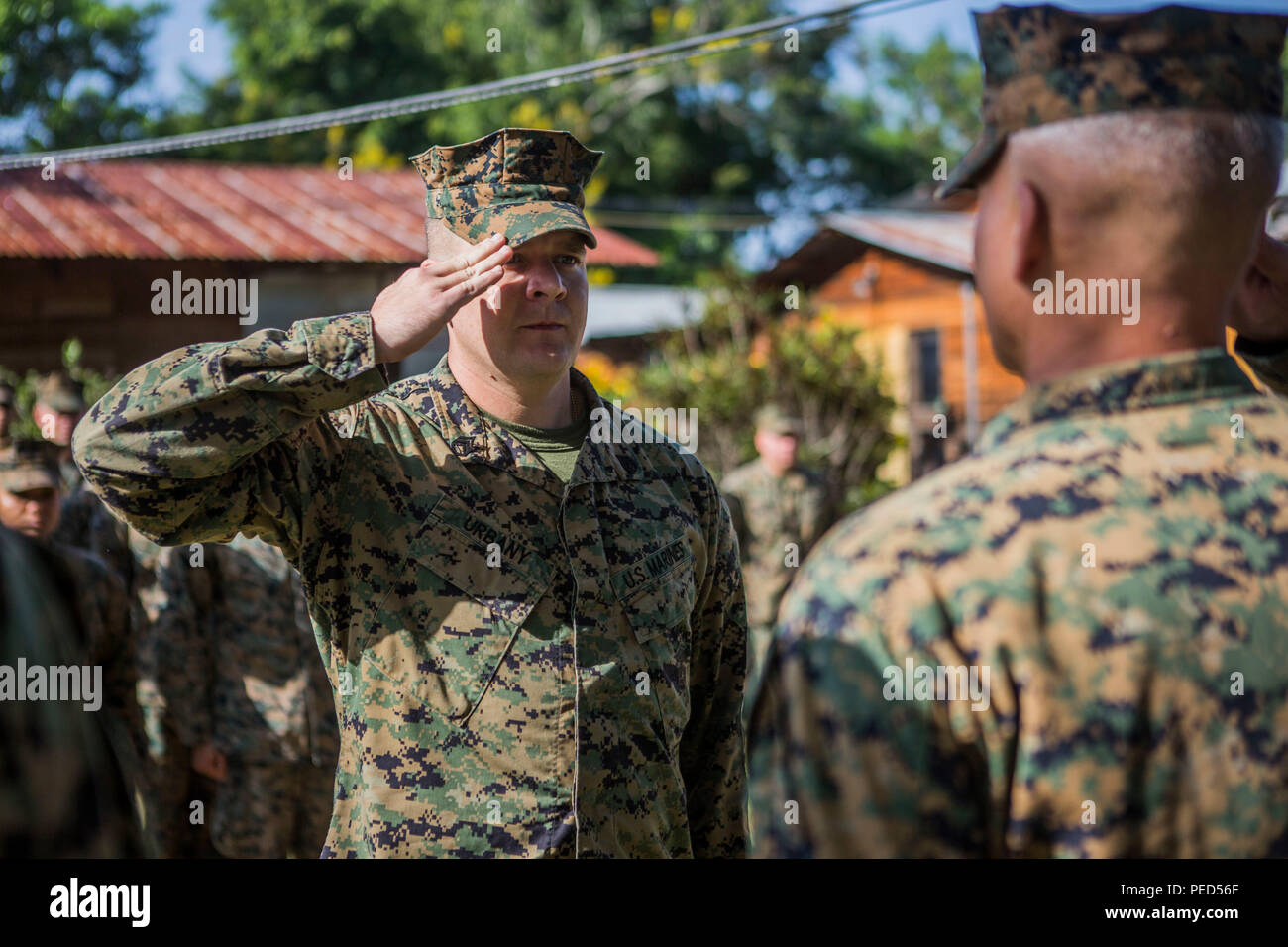 U.S. Marine Corps Staff Sgt. Edward C. Urbany, left, radio chief ...