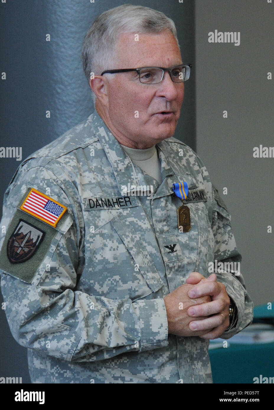 Col. Daniel Danaher delivers his retirement speech to family and fellow ...
