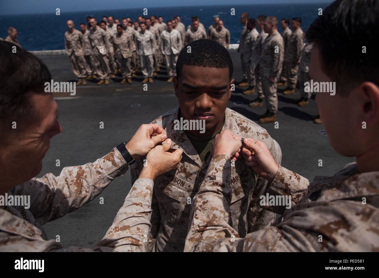 INDIAN OCEAN (Aug. 1, 2015) U.S. Marine Cpl. Darius Thompson is pinned ...