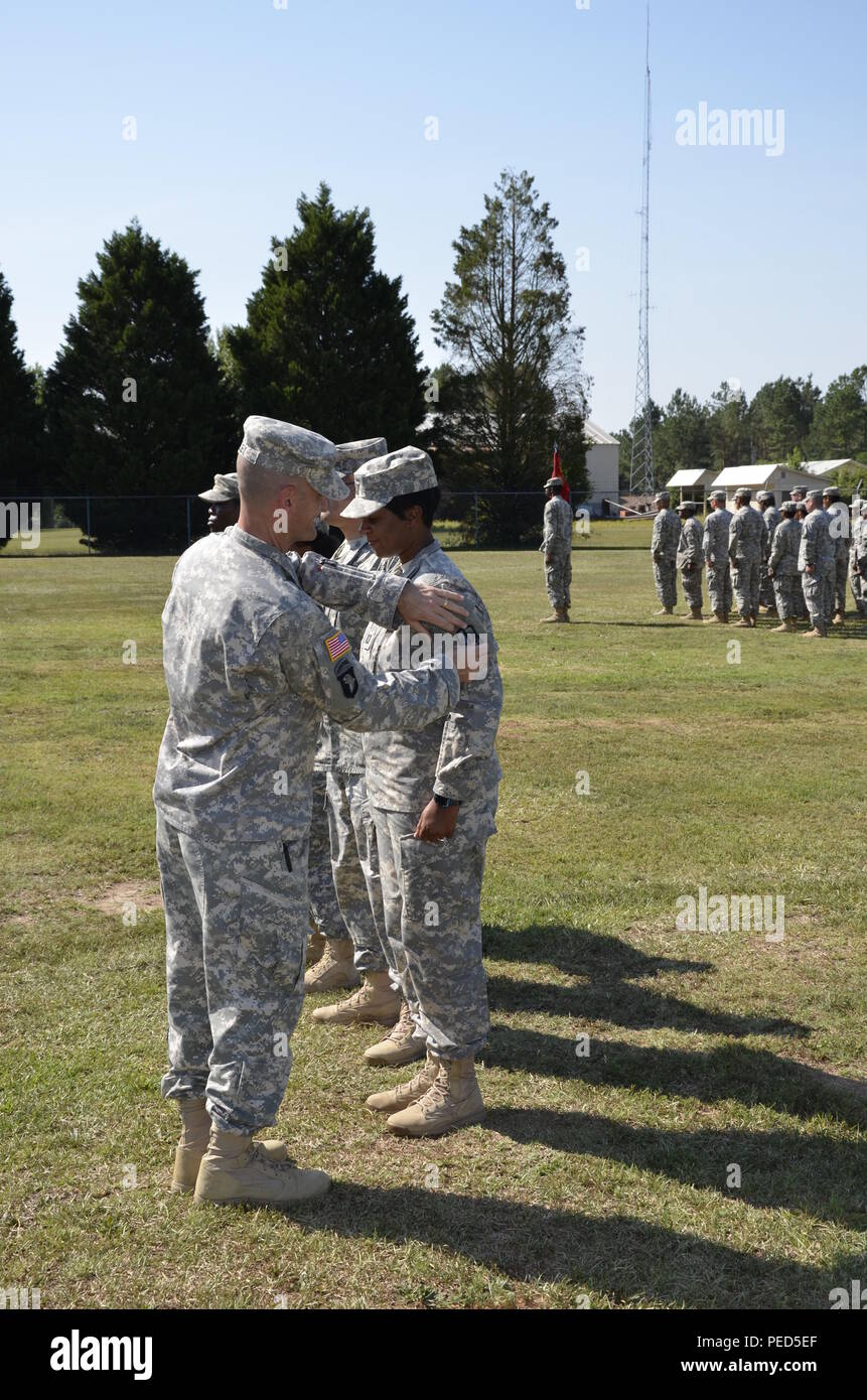Soldiers with the 1050th Transportation Battalion are presented with ...