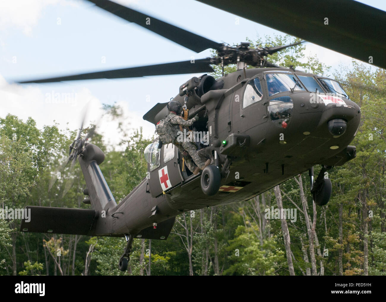 A flight medic with Charlie Company, 3rd Battalion, 126th Aviation ...