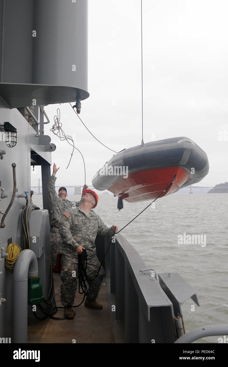 Army Reserve Soldiers of the 481st Transportation Company load a work ...