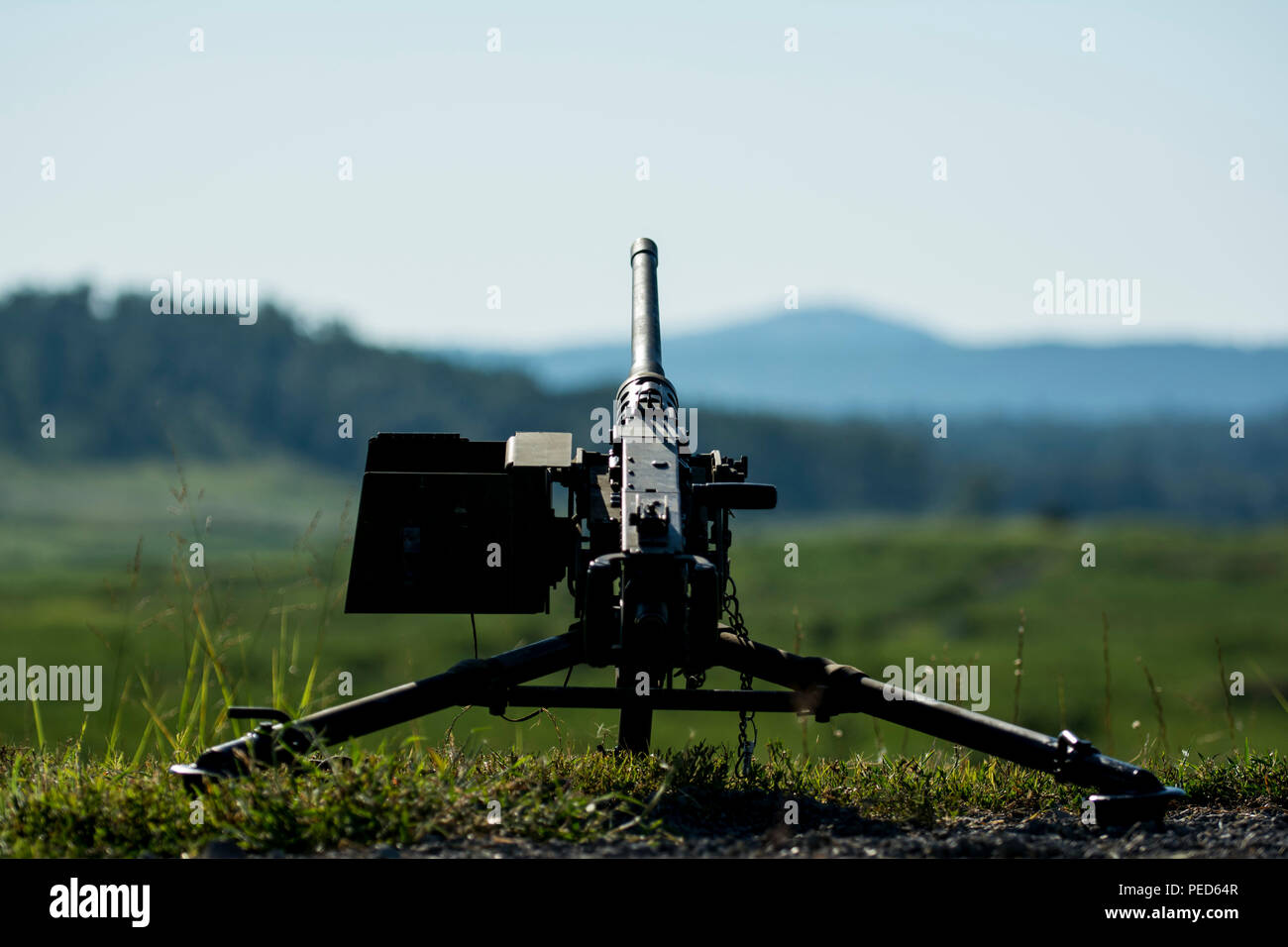 An M2 Browning .50-caliber machine gun sits on a range lane at Fort ...