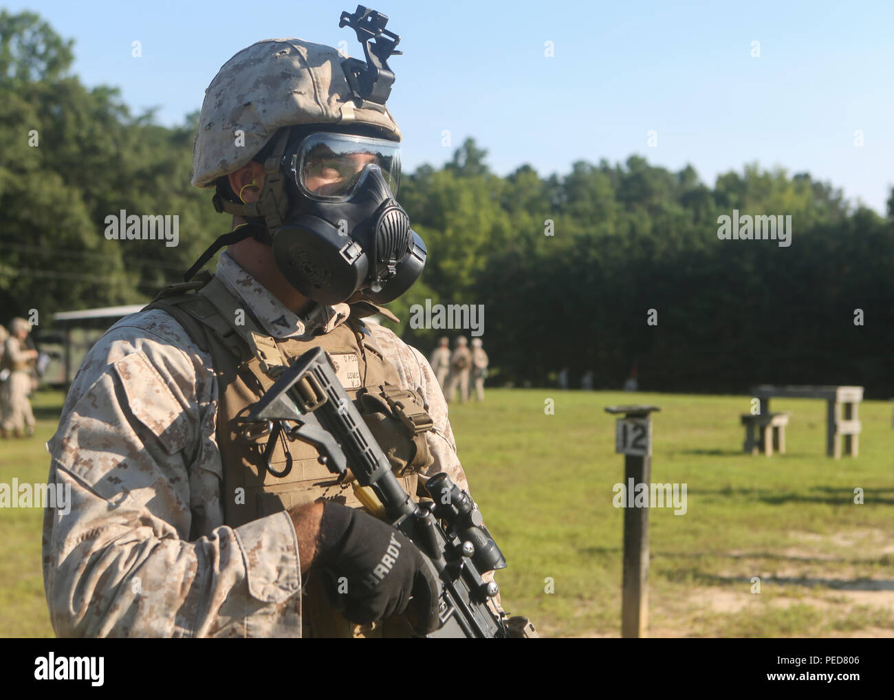 A Marine with 2nd Combat Engineer Battalion prepares to shoot his ...