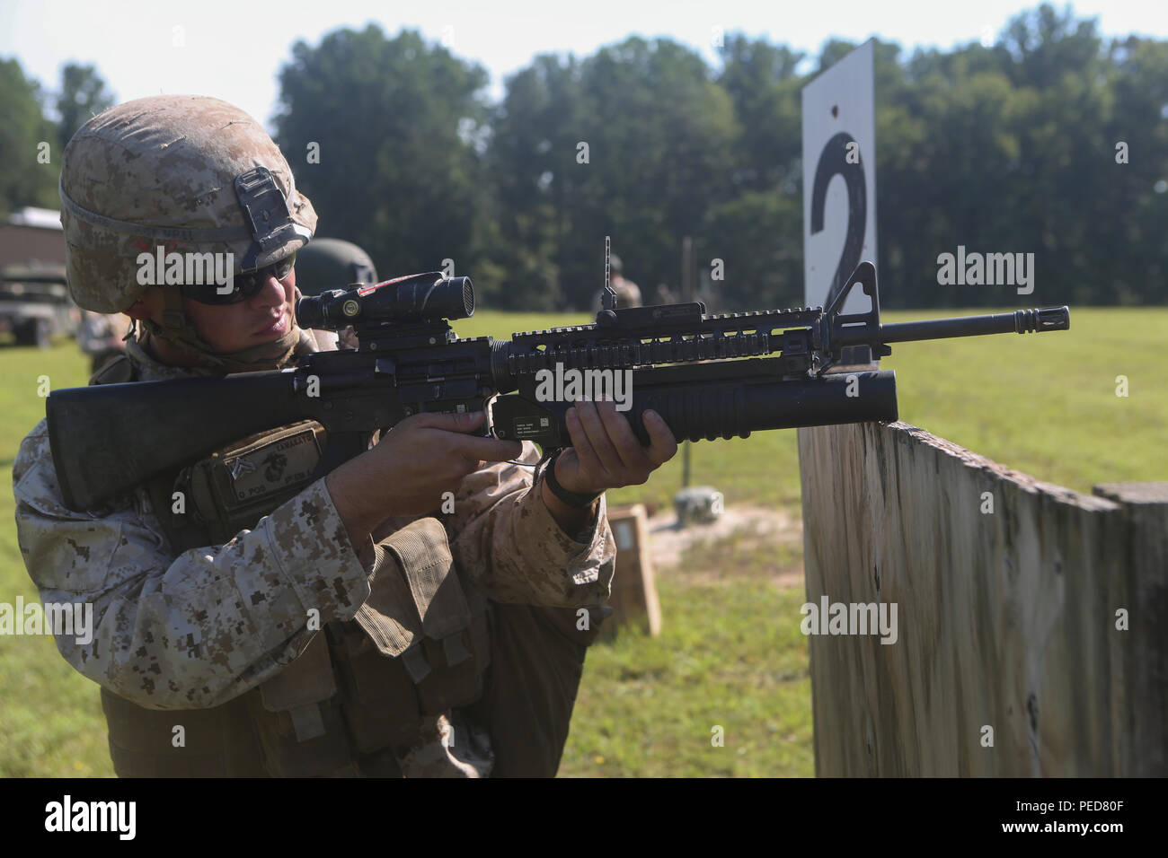 A Marine with 2nd Combat Engineer Battalion shoots a training round ...