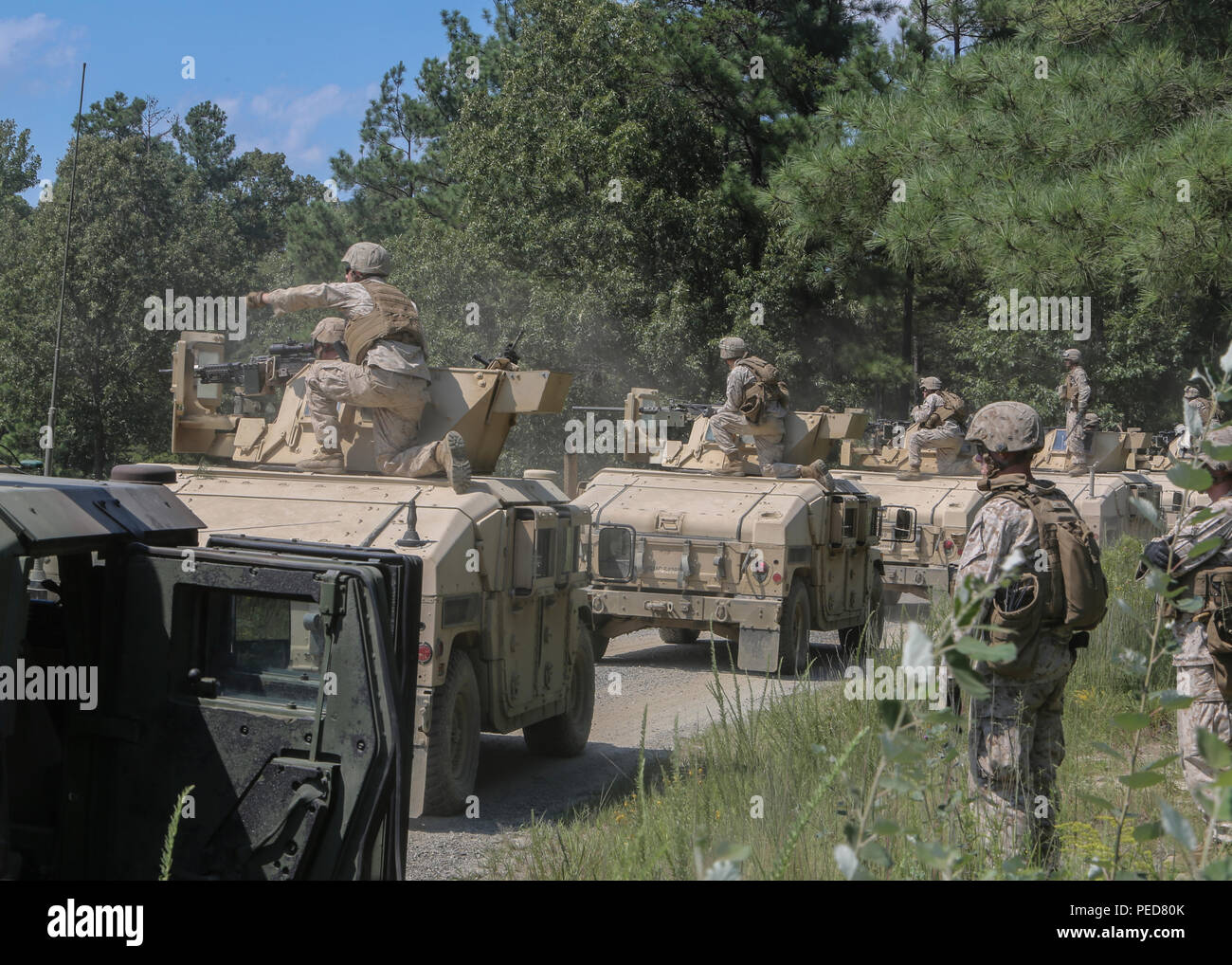 Marines with Support Company, 2nd Combat Engineer Battalion, fire M240B ...