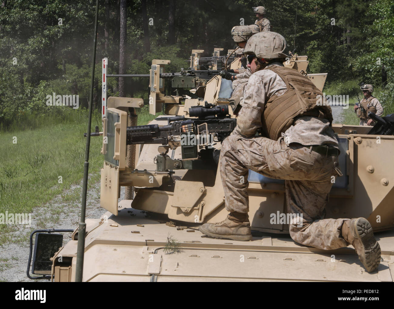 Marines with Support Company, 2nd Combat Engineer Battalion, fire M240B ...