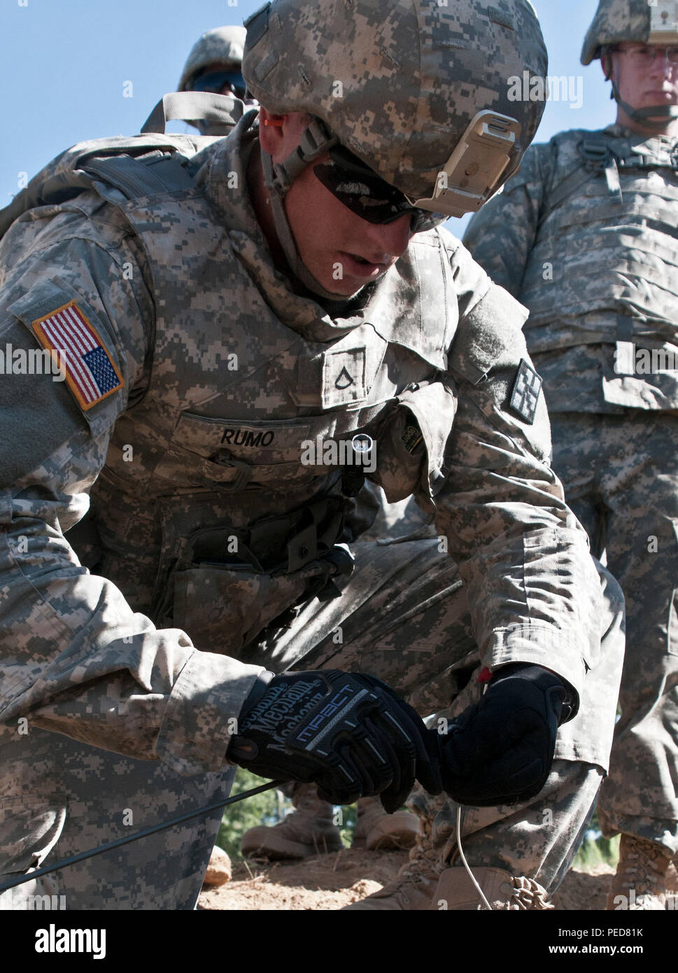 Range cadre demonstrate how to set up C4 explosive charges with the ...