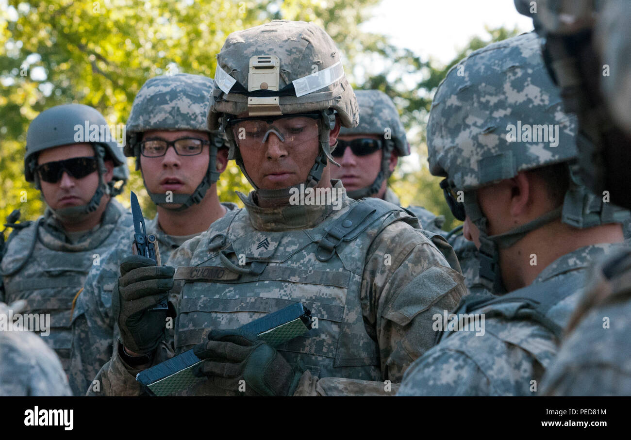 Range cadre demonstrate how to set up C4 explosive charges with the ...