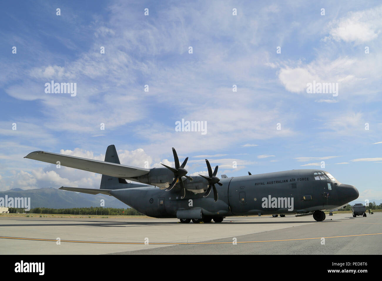 A Royal Australian Air Force C-130J Hercules is parked on the flight ...
