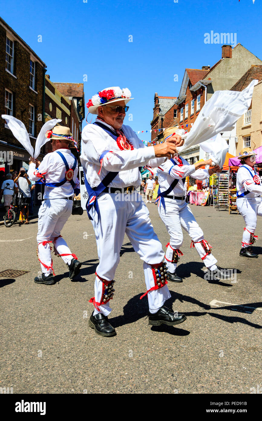 Traditional English folk dancers from the East Kent Morris side dancing ...
