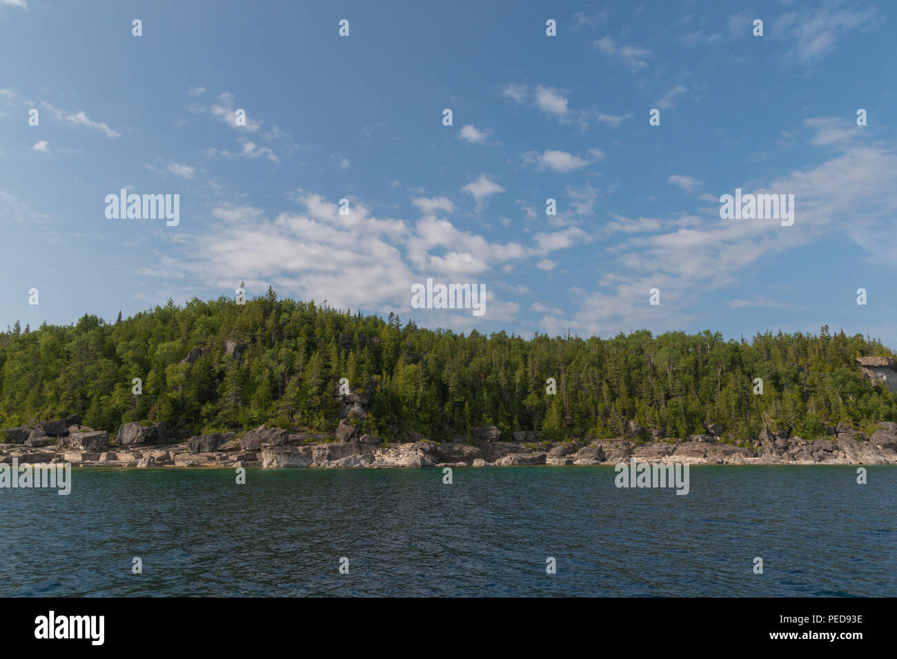 Bright beautiful landscape of Niagara Escarpment limestone cliffs along ...