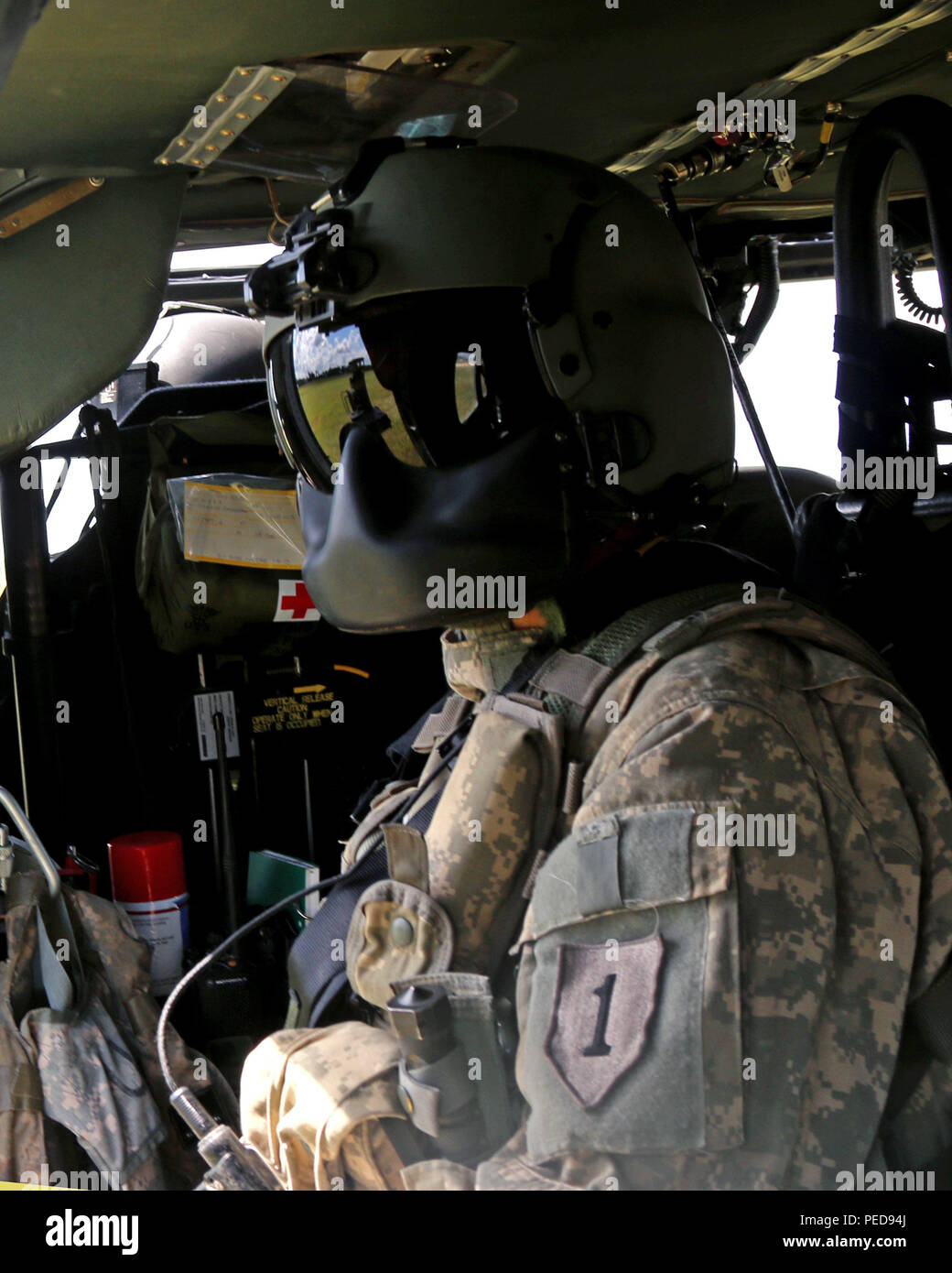 A crew chief assigned to the 1st Infantry Division, Fort Riley, Kan ...
