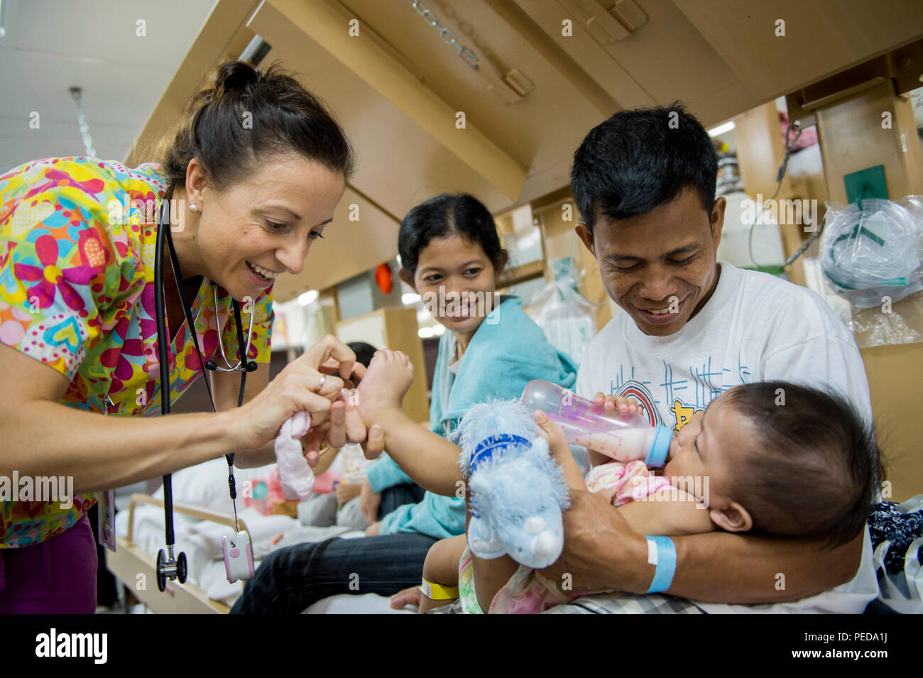 SUBIC BAY, Philippines (Aug 08, 2015) Kelly Ince, a nurse with ...