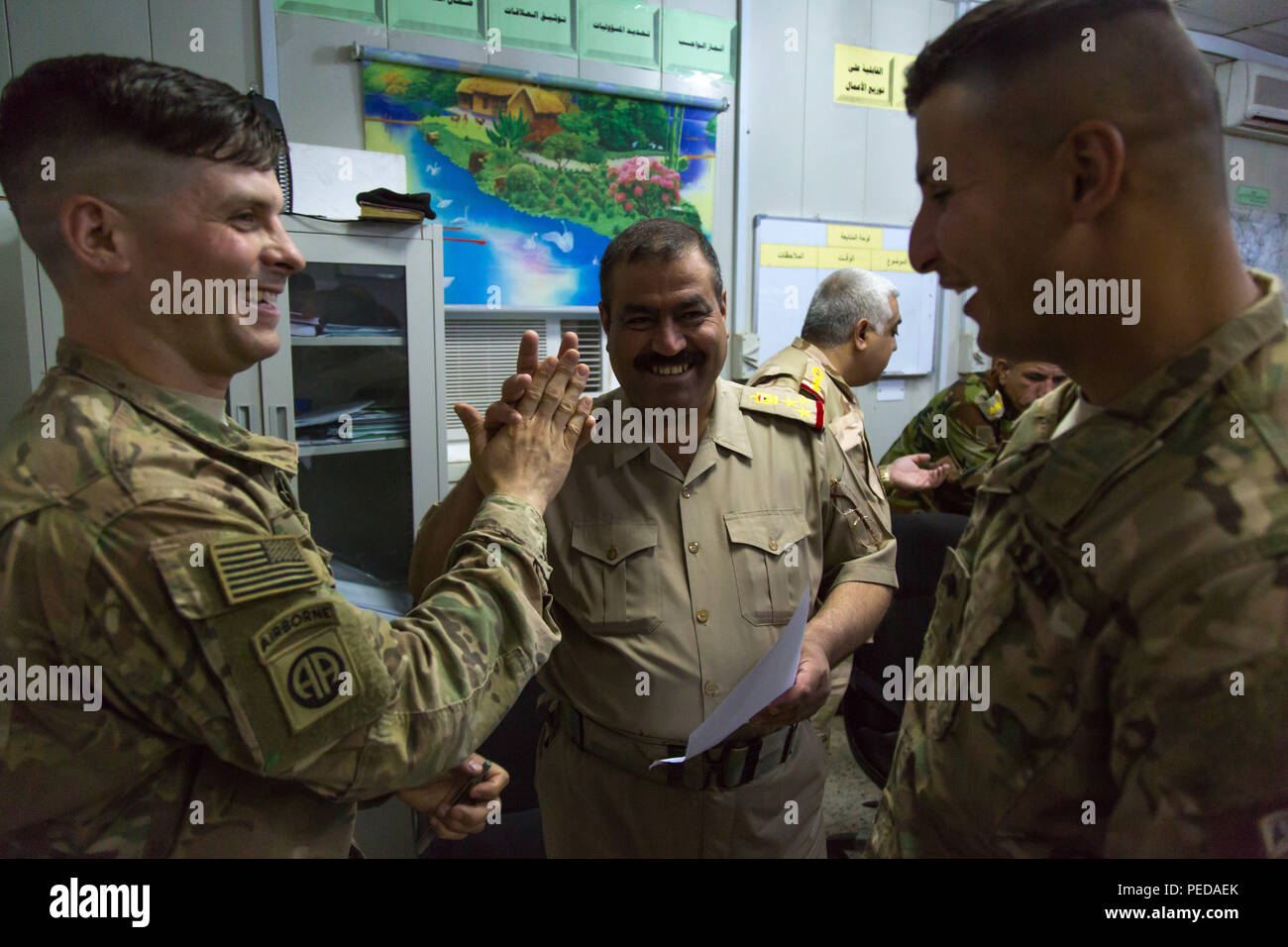 U.S. Army Capt. Seth Smith (left), a paratrooper assigned to ...