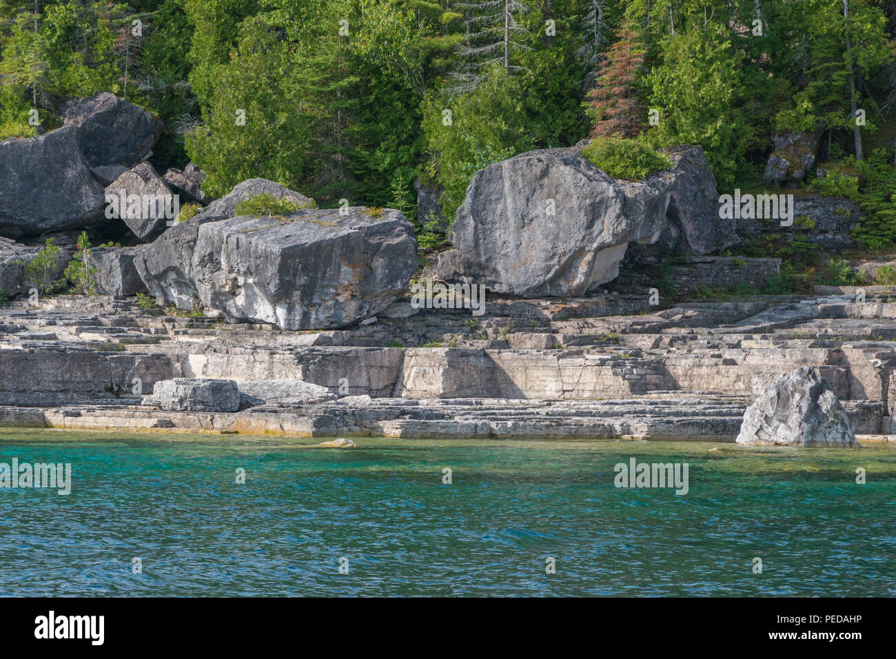 Bright beautiful landscape of Niagara Escarpment limestone cliffs along ...