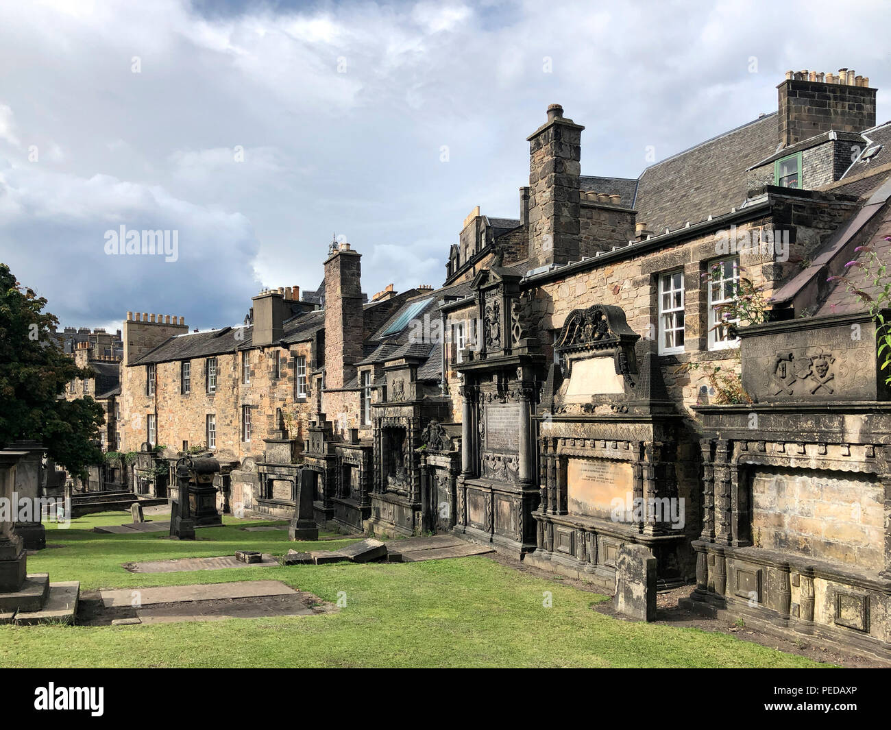 Tombs in Greyfriars Kirkyard. A graveyard surrounding Greyfriars Kirk ...