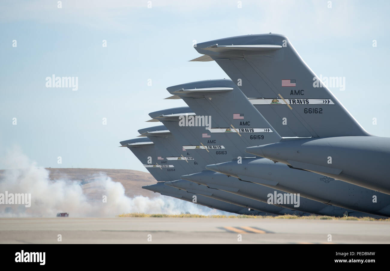 Firefighters from the 60th Civil Engineer Squadron at Travis AFB, Calif ...