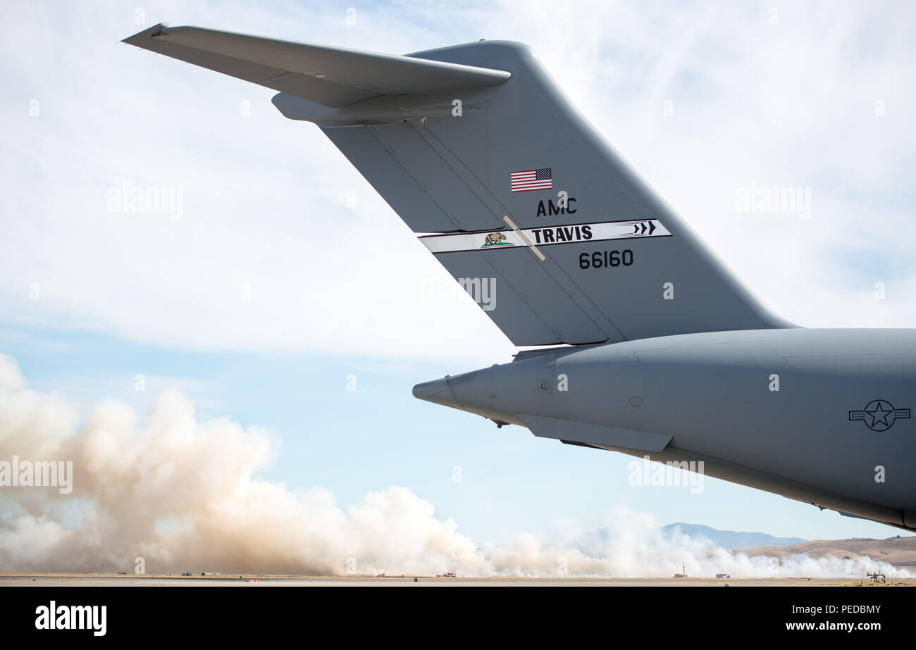 Firefighters from the 60th Civil Engineer Squadron at Travis AFB, Calif ...