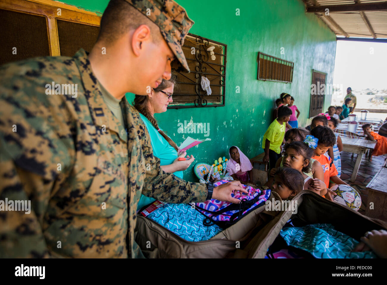 U.S. Marine Corps Capt. Ernesto De La Riva, a civil affairs officer ...