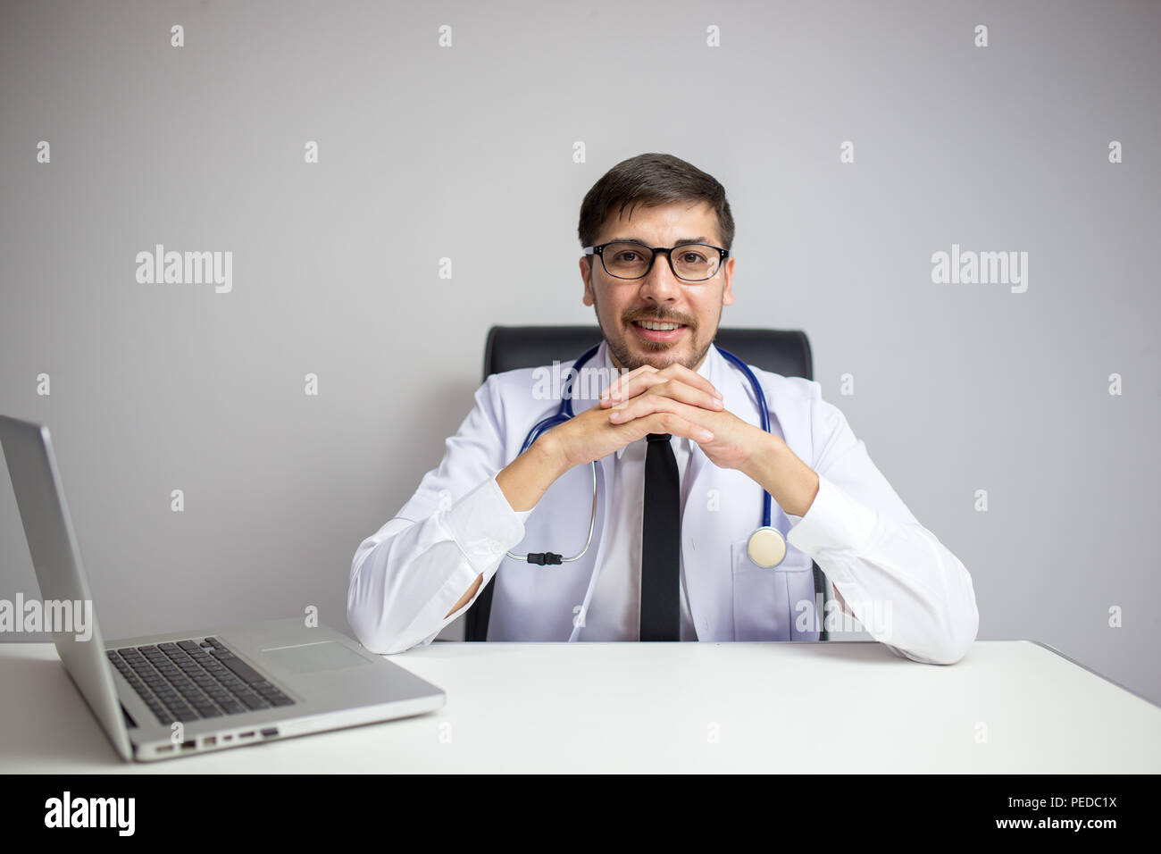 Portrait cheerful male doctor work hi-res stock photography and images ...