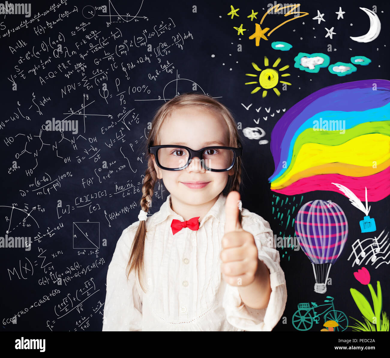 Creativity education concept. Smiling little girl student having fun ...