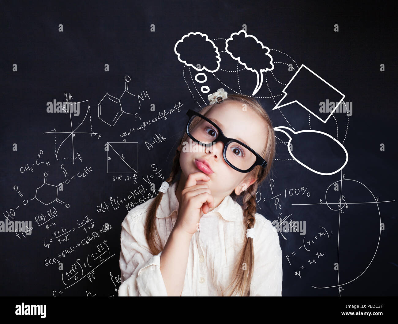 Thinking child with a school blackboard. Kids mathematics concept Stock ...