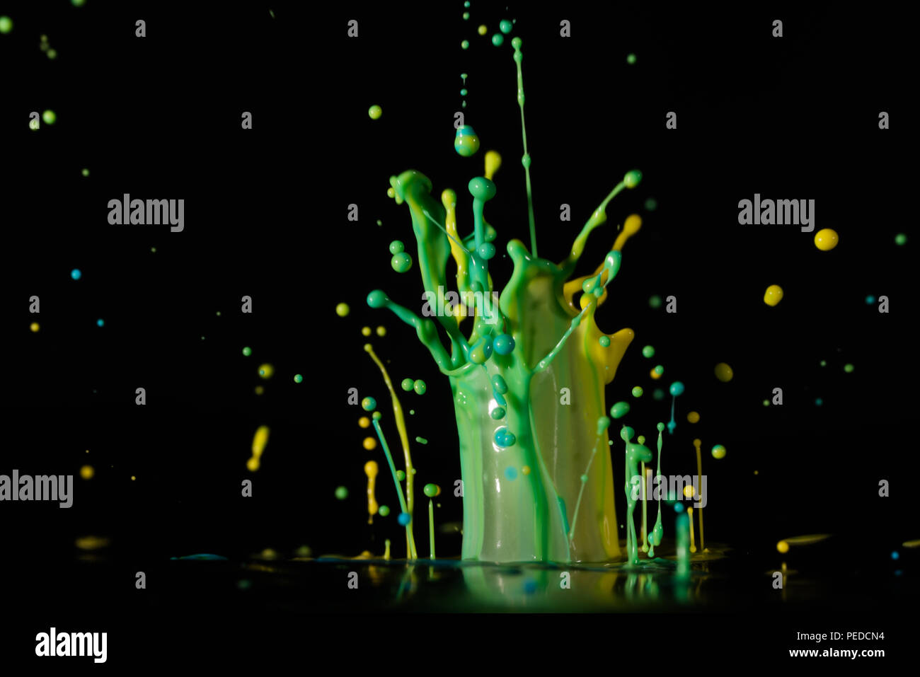 abstract color splash isolated on black background Stock Photo - Alamy