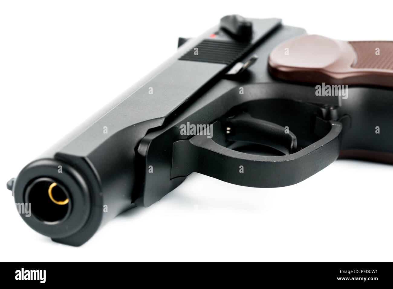Automatic gun pistol on dark background Stock Photo - Alamy