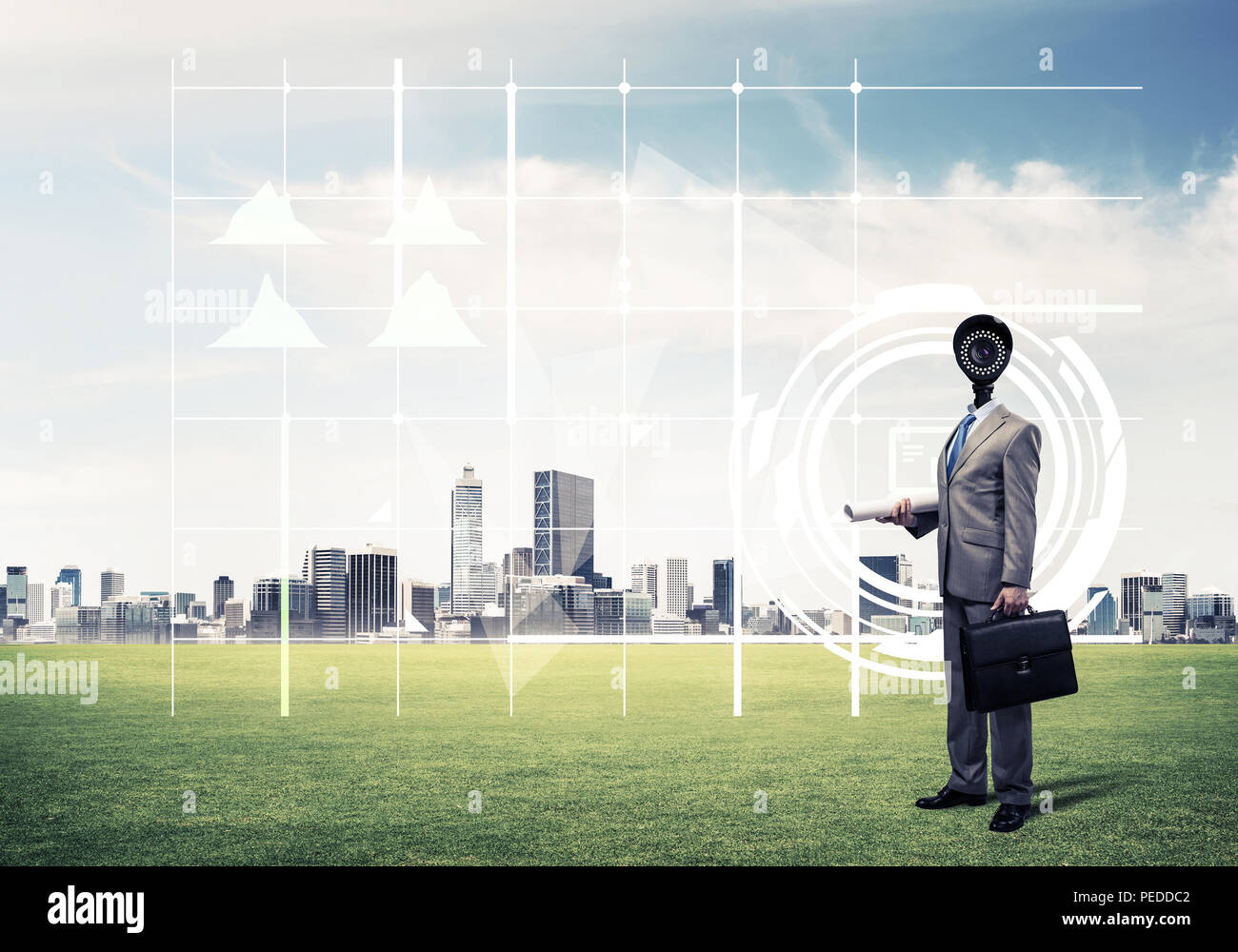 Camera headed man standing on green grass against modern citysca Stock ...