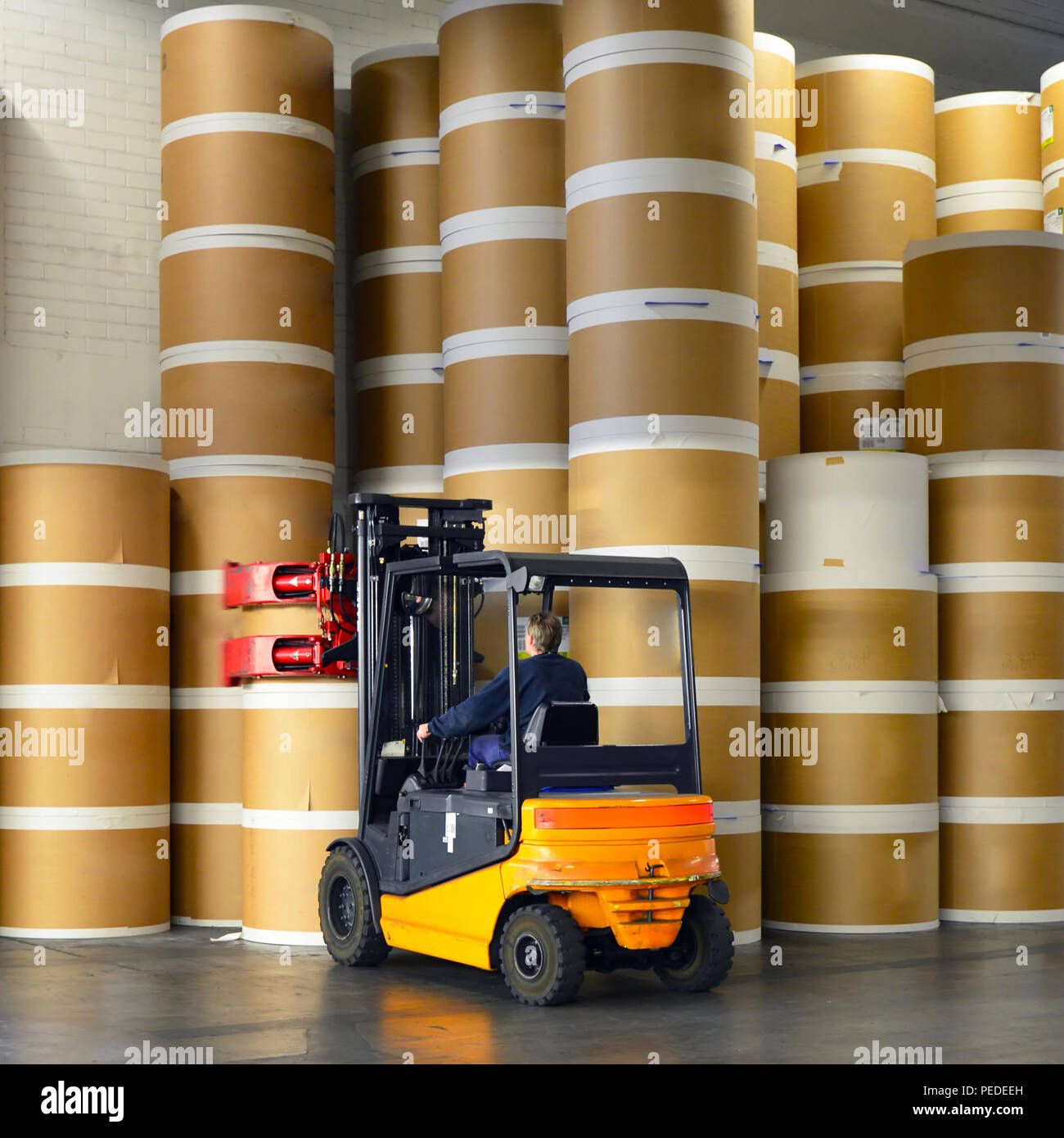 Rolls paper forklift in warehouse hi-res stock photography and images ...