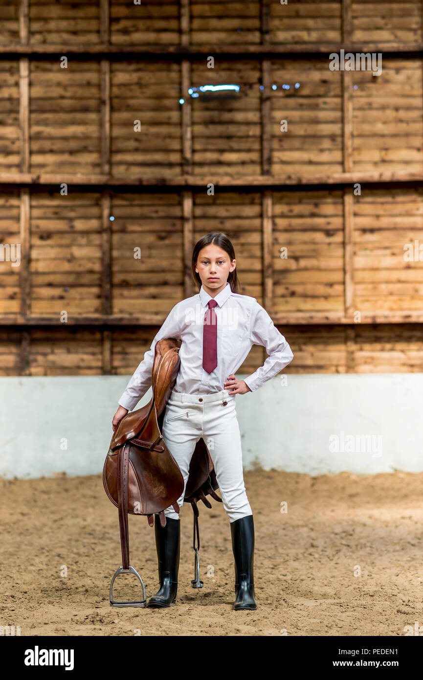 Beautiful child model Bailey works through different looks on a shoot ...