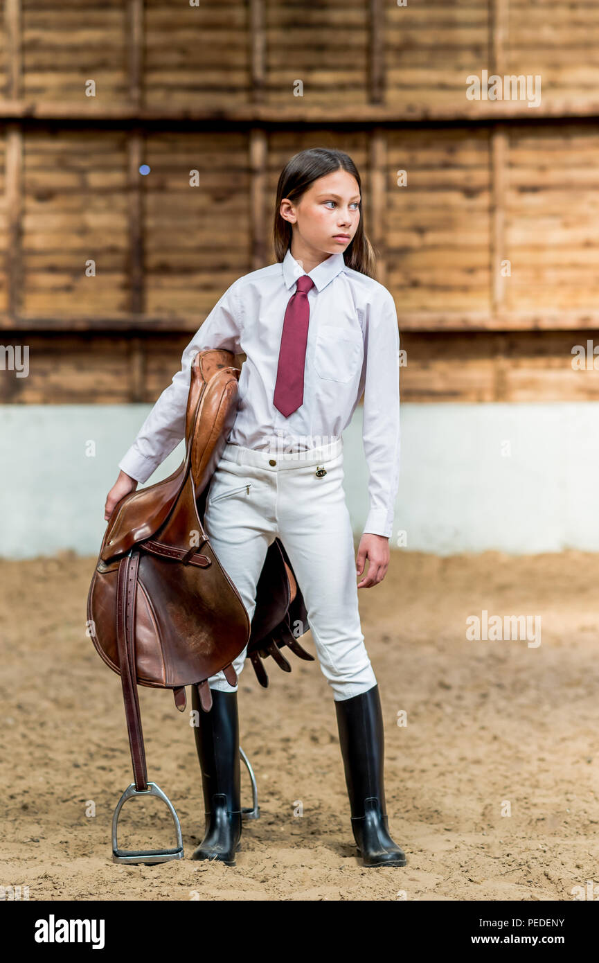 Beautiful child model Bailey works through different looks on a shoot ...